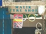 Malik (Province of Sindh, Karachi, Gulshan-e-Iqbal, 16 Block), jant ve lastikçiler  Karaçi'den
