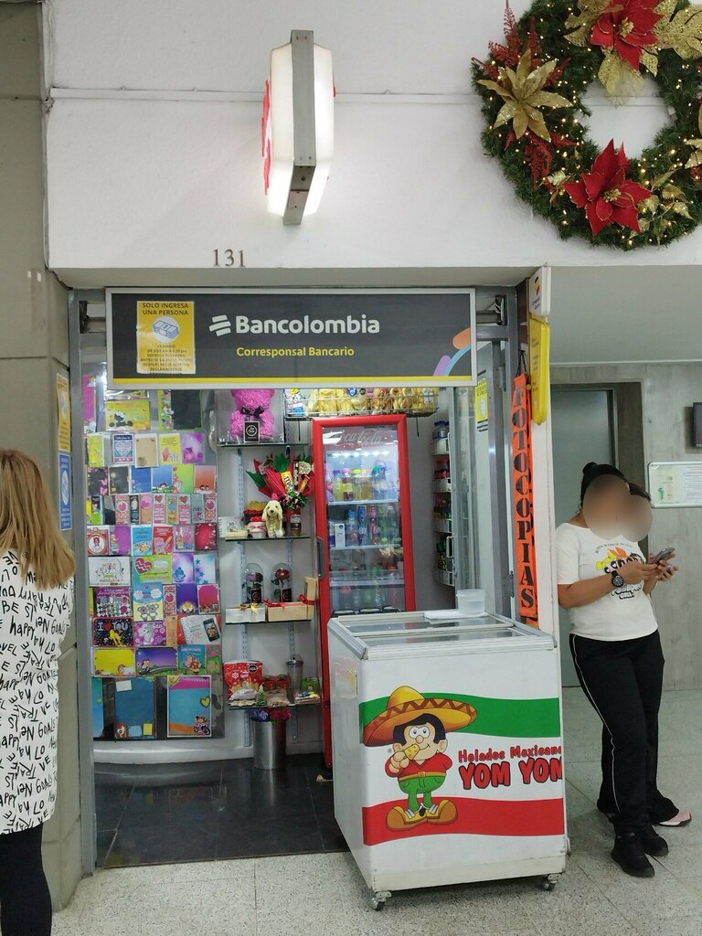 Ev temizlik ürünleri Bancolombia Corresponsal bancario, Medellin, foto