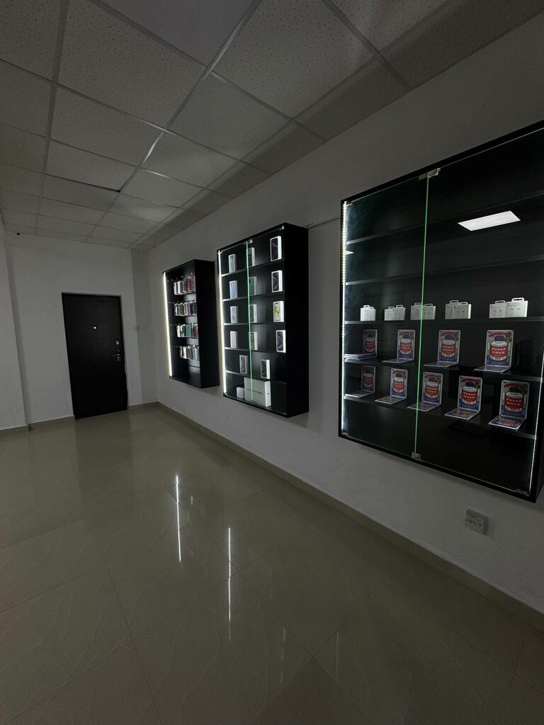 Elektronik eşya mağazaları Apple Status, Asbest, foto