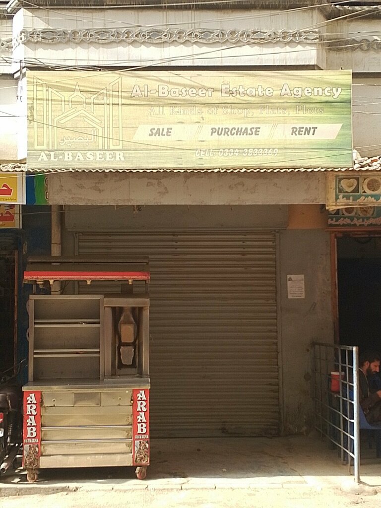 Emlak ofisi Al baseer estate agency, Karaçi, foto