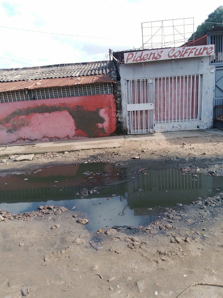 Berberler Piden's Coiffute, Loanda, foto