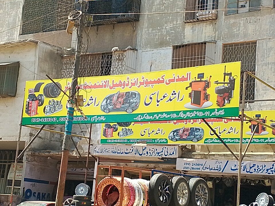 Jant ve lastikçiler Al madni, Karaçi, foto