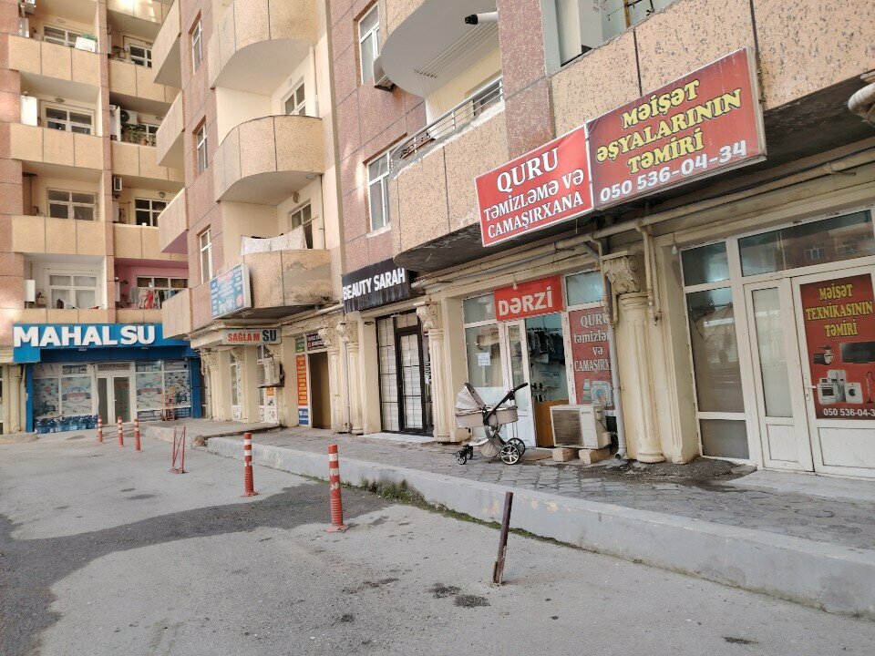 Kıyafet tamiri Dərzi, Bakü, foto