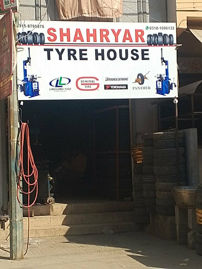 Oto lastik tamiri Share share, Karaçi, foto