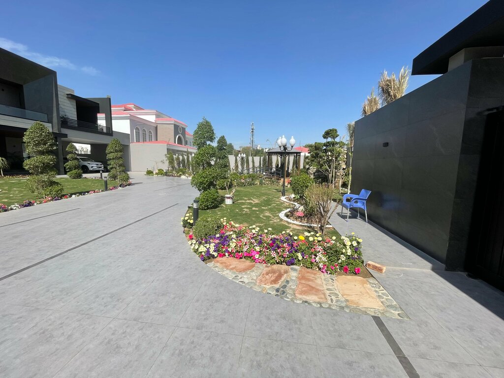 Mimari proje firmaları Miraj Son's Landscaping Waterfall Fountain And Maintain Lawn, Lahor, foto