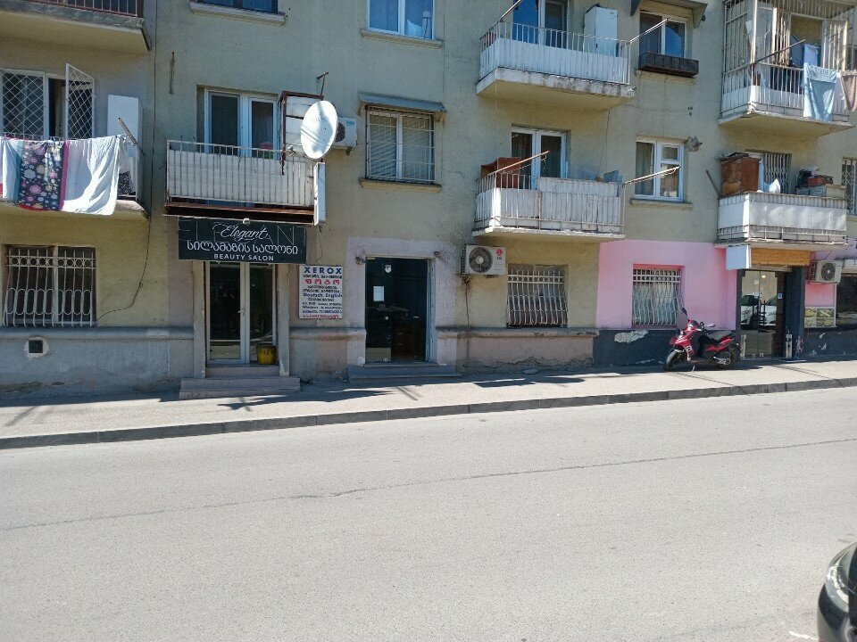 Mühürlerin ve pulların Xerox and CompService, Tiflis, foto