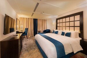 Blue Inn (Arriyad, Al Wurud District, King Abdullah Ibn Abdulaziz Saud Street), otel  Abha'dan