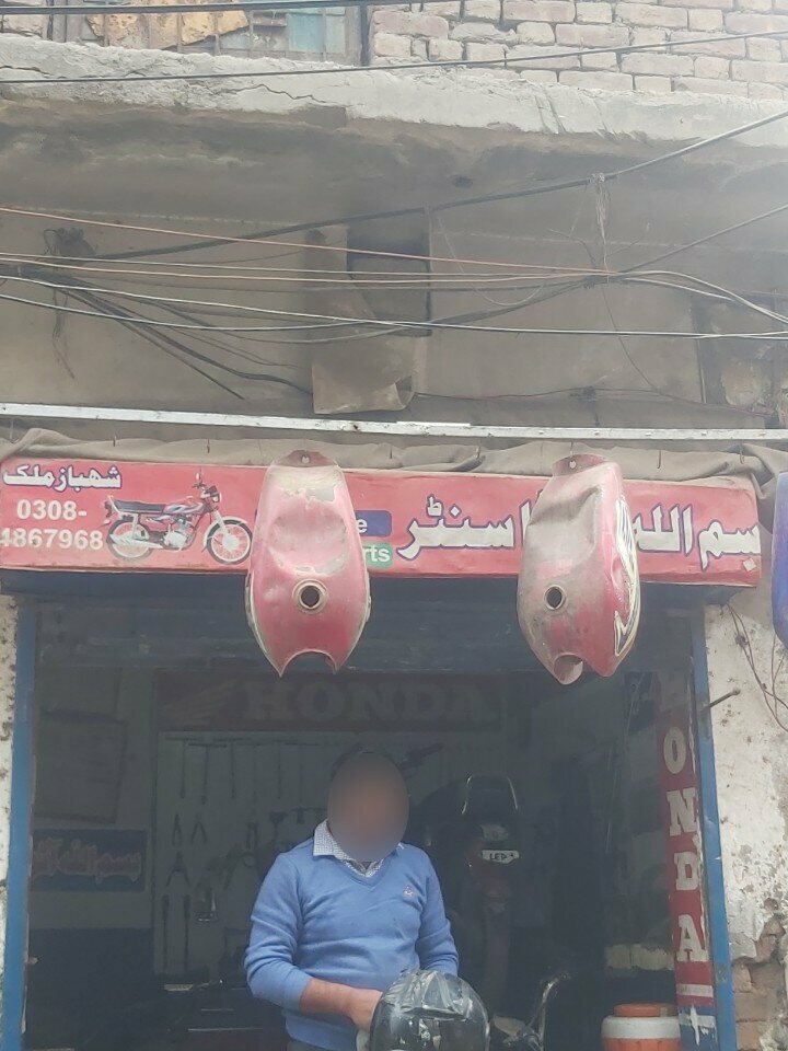Motosiklet tamiri Bismillah Honda center, Lahor, foto