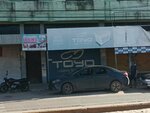 Toyo bate servi (Santa Cruz de la Sierra, Distrito Municipal 8, Avenida Paurito), yönetim ofisi  Santa‑Krus'tan