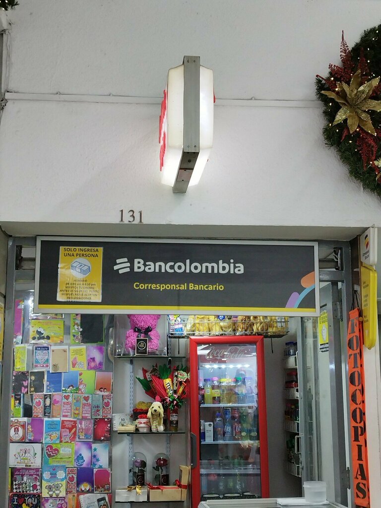 Ev temizlik ürünleri Bancolombia Corresponsal bancario, Medellin, foto