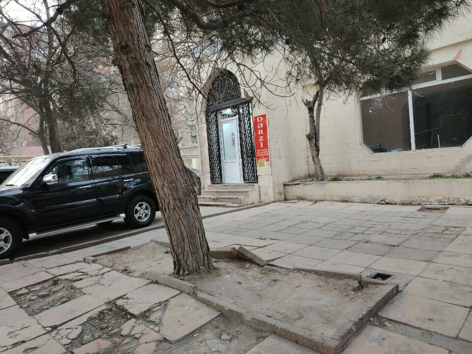 Kıyafet tamiri Dərzi, Bakü, foto