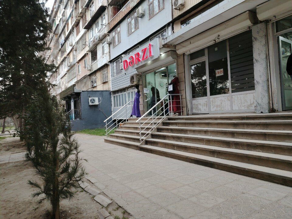Kıyafet tamiri Dərzi, Bakü, foto