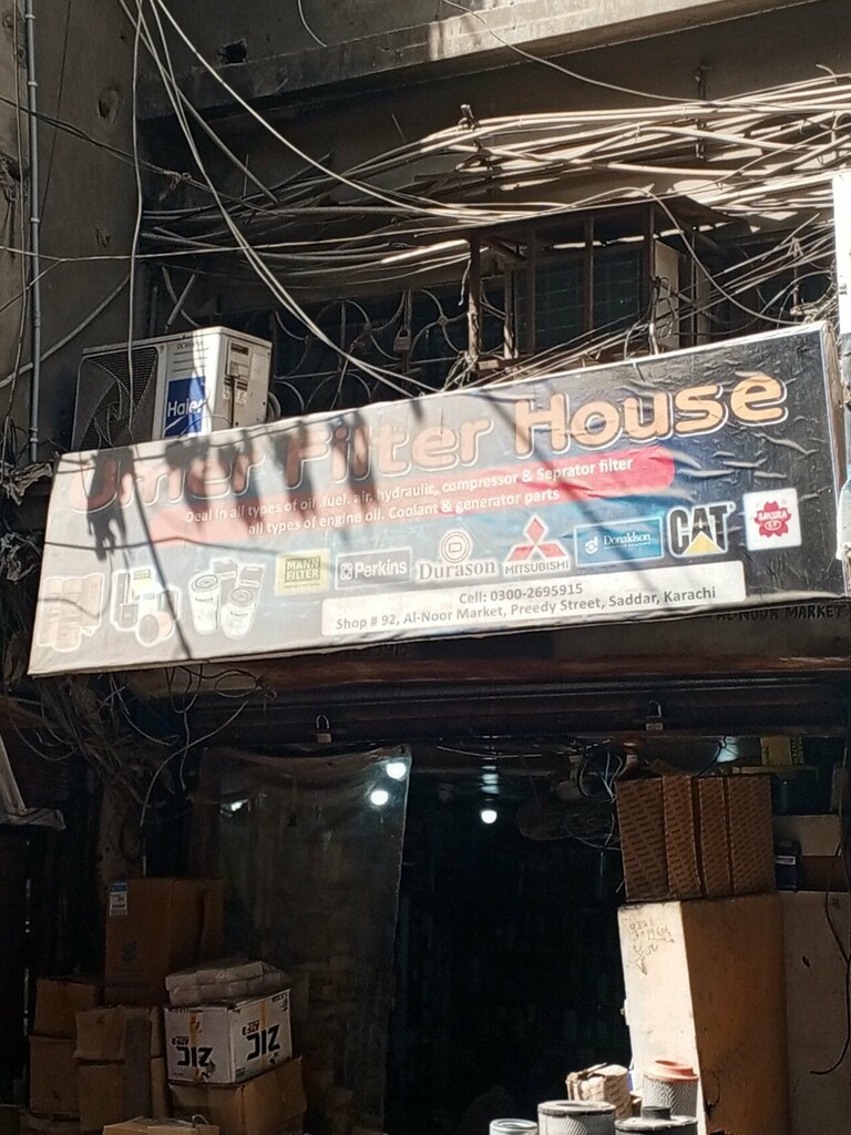Otomobil yedek parçaları Umer filter house, Karaçi, foto