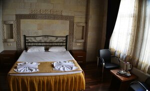 Cappadocia Stone Palace (Nevşehir, Nevşehir Merkez, Göreme Beldesi, İsali-Gaferli-Avcılar Mah., Müze Cad.), otel  Nevşehir'den