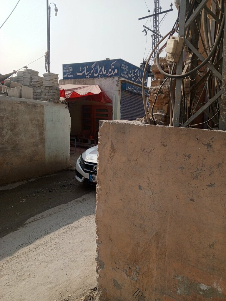 Taş ürünler ve yapılar Mozakair, Rawalpindi, foto