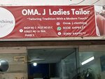 Oma. j ladies tailor (Badar Commercial 12-A Street No:20E), giyim mağazası  Karaçi'den