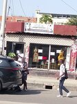 Shamy (Luanda Province, Municipality of Luanda, Samba Pequena), dış giyim mağazası  Loanda'dan