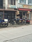 Taller de motos (Valle del Cauca, Municipio de Santiago de Cali, Calle 14, 37-03), benzin istasyonu  Cali'den