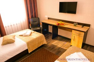 Orient (Iskhak Razzakov Avenue No:4/1, Osh), otel  Osh'tan