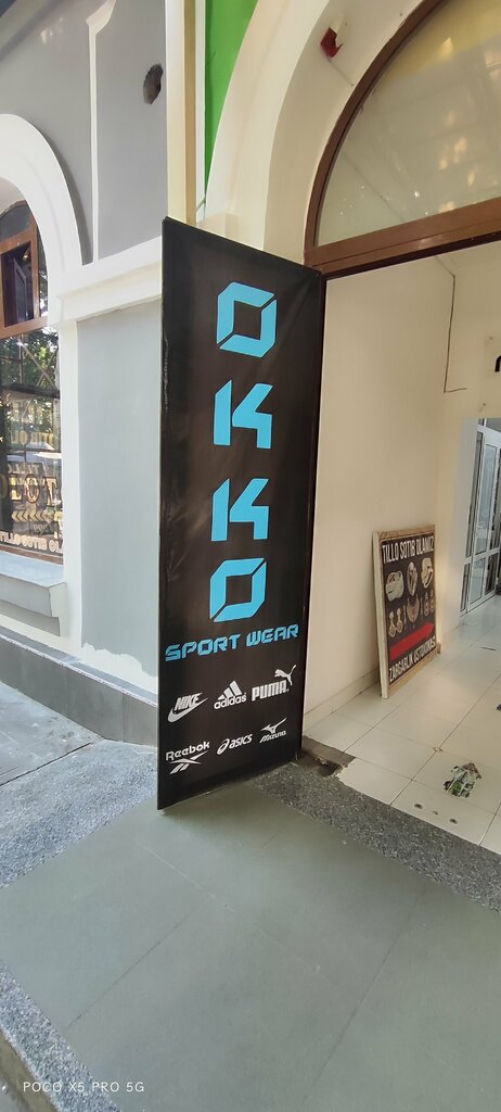 Spor giyim ve ayakkabı Окко Спорт Веар, Semerkant, foto