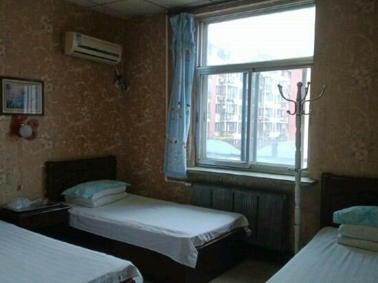 Daireler Shenyang Xinhongyuan Guest House, Shenyang, foto