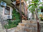 Вилла Мира (Подгорная улица No:14А, посёлок городского типа Курортное), otel  Kırım Cumhuriyeti'nden