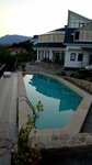 Gostevoj Dom Solnechnyij (Курортная улица No:4Д, село Солнечногорское), otel  Kırım Cumhuriyeti'nden