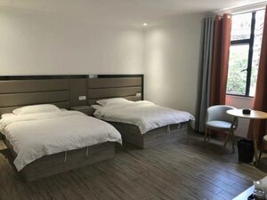 Xinglang Hotel (Songshan Road No:88), otel  Wuzhou'dan