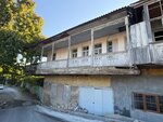 Дом купца Мелкоева (Tskhinvali, Naberezhnaya ulitsa), koruma altına alınmış yapı  Chinval'dan