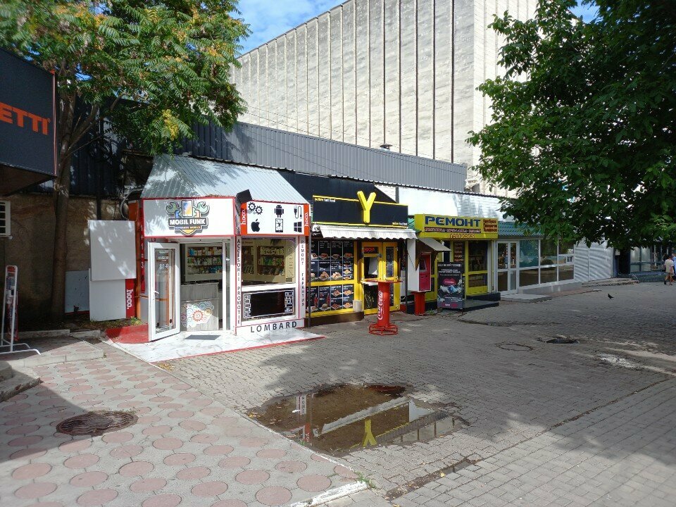 Telefon tamir servisi Mobilfunk Service, Beltsi, foto