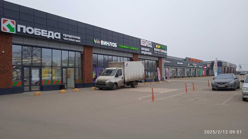 Alışveriş merkezleri Загородный, Belooziorski, foto
