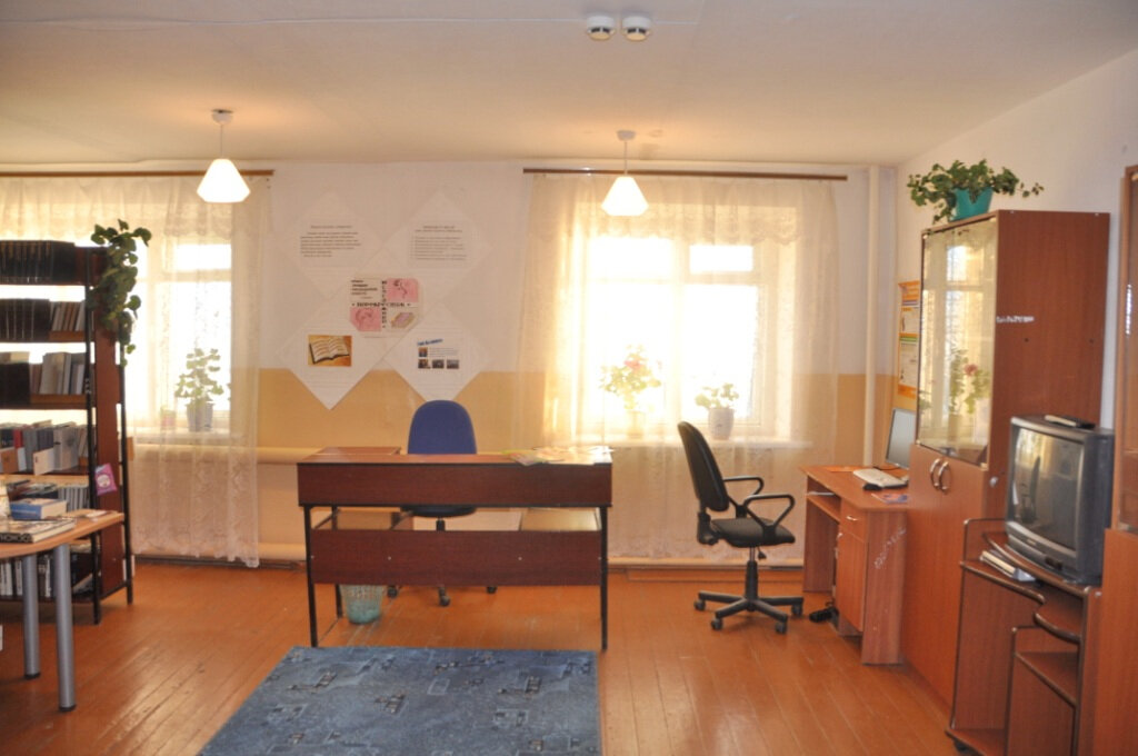 Kütüphaneler Tselinnaya mezhposelencheskaya tsentralnaya biblioteka, Kurganskaya oblastı, foto