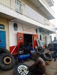 Panafrica (Brazzaville, Commune de Moungali, Rue Moundzombo), jant ve lastikçiler  Brazzaville'den
