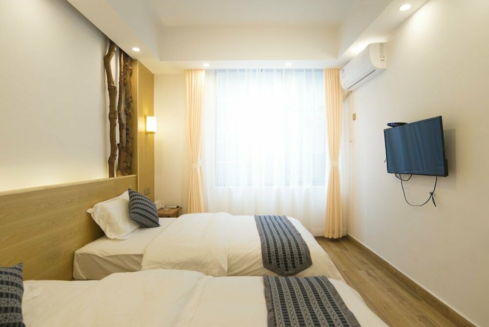 Otel Jiesu Renwen Guest House, Zhangjiajie, foto