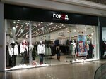Город (Евпаторийское шоссе No:8), giyim mağazası  Simferopol'dan (Akmescit'ten)