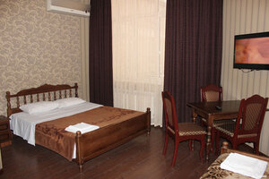 Астория (ulitsa Levchishina No:22А, stanitsa Suvorovskaya), otel  Stavropolski krayından