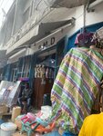 M. D (Brazzaville, Commune de Poto-Poto), çocuk ürünü toptancıları  Brazzaville'den