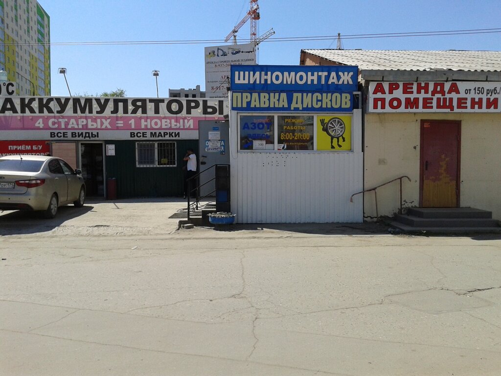 Oto lastik tamiri Shinomontazh, Engels, foto