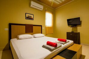 Yani Homestay (West Sumatra, Padang), otel  Padang'dan