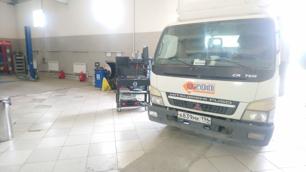 Otomobil servisi Avant, Asbest, foto