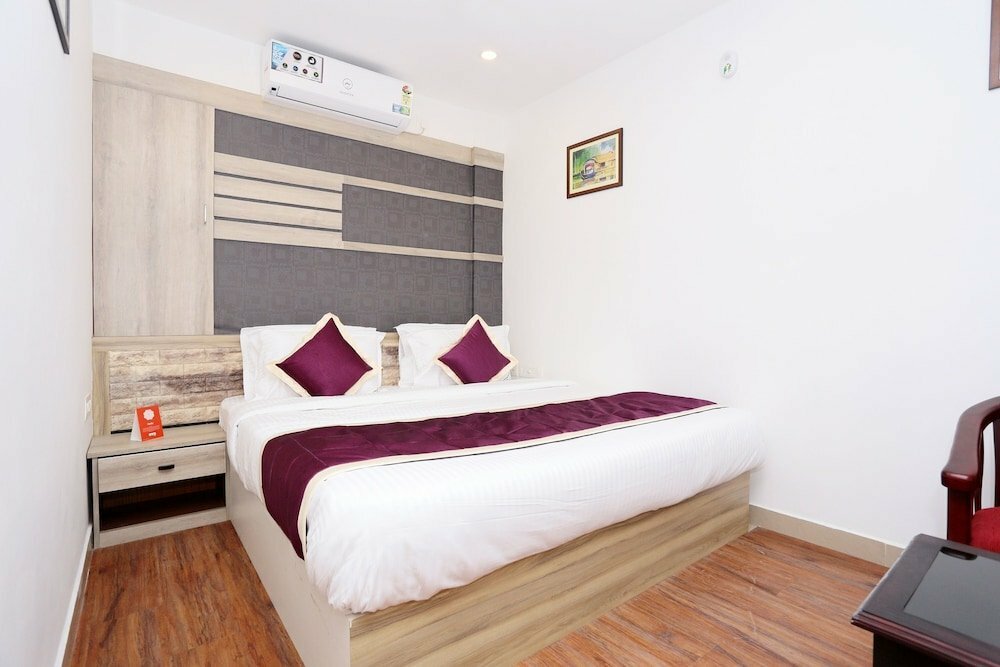 Otel Capital O 22485 Tcs Suites, Kerala, foto