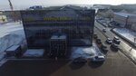 Nur Daulet Business Center (Halyqtar Dostyǵy kóshesi No:12/1), i̇ş merkezi  Aksay'dan