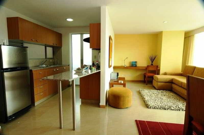 Adlandırılmış bina Affinity Apartahotel, Medellin, foto
