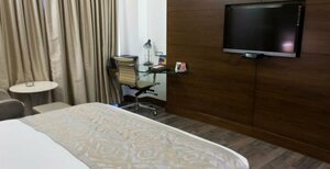 Fabhotel Blossoms Pune Airport (State of Maharashtra, Pune, Aqua Line, Anand Nagar), otel  Pune'den