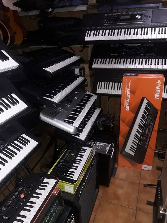 Müzik enstrumanların tamiri Melody Instrumentos, , foto