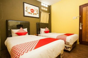 Sentosa Jaya Guest House by Oyo Rooms (North Sumatra, Kota Medan City, City of Medan), otel  Medan'dan