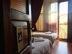 Saatli Konak (Balıkesir, Ayvalık, Fevzipaşa-Vehbibey Mah., Muradiye Çarşı Aralığı Sok., 20), otel  Ayvalık'tan