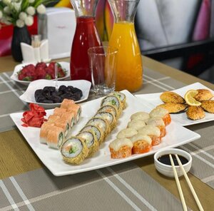 Sushi Time (Volkhovskaya naberezhnaya No:40), suşi restoranı  Kirishi'den