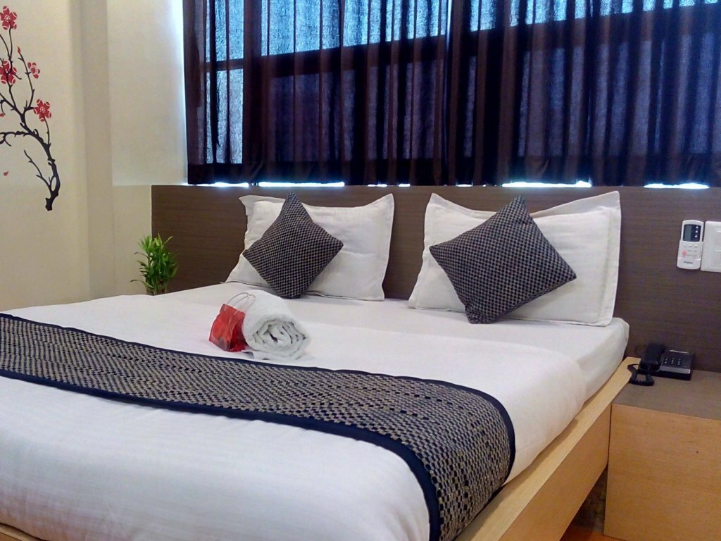 Otel Fabexpress Relax Inn, Ahmadabad, foto