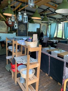 Wood house (Oktyabrskaya ulitsa No:1А), kafe  Azov'dan